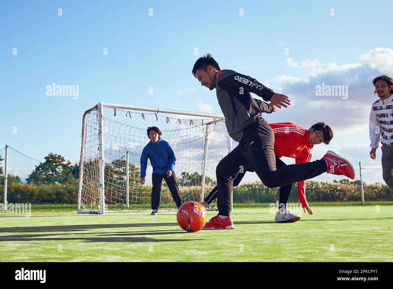 A player tries to shoot through the defense Stock Photo - Alamy