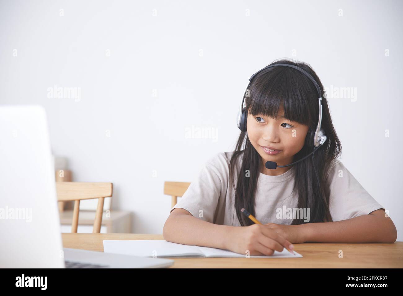Girls Learning Online Stock Photo - Alamy