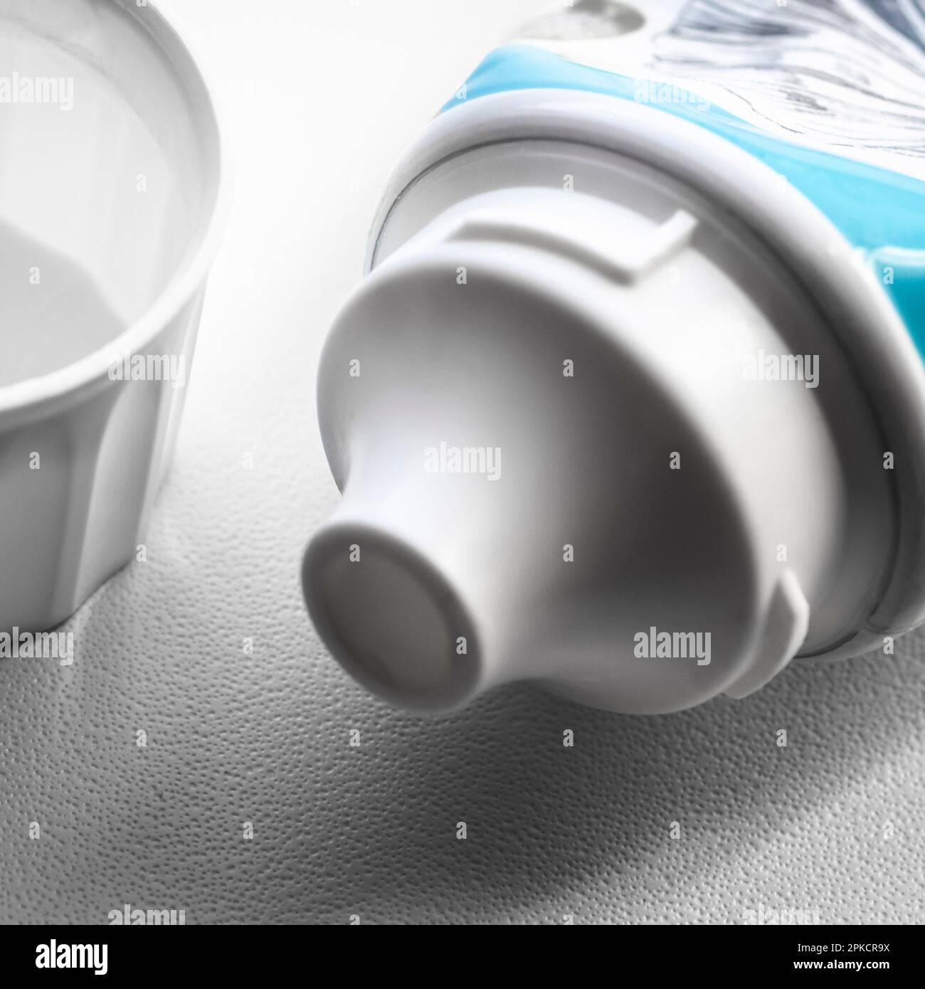 Partially used open tube with toothpaste close-up Stock Photo - Alamy