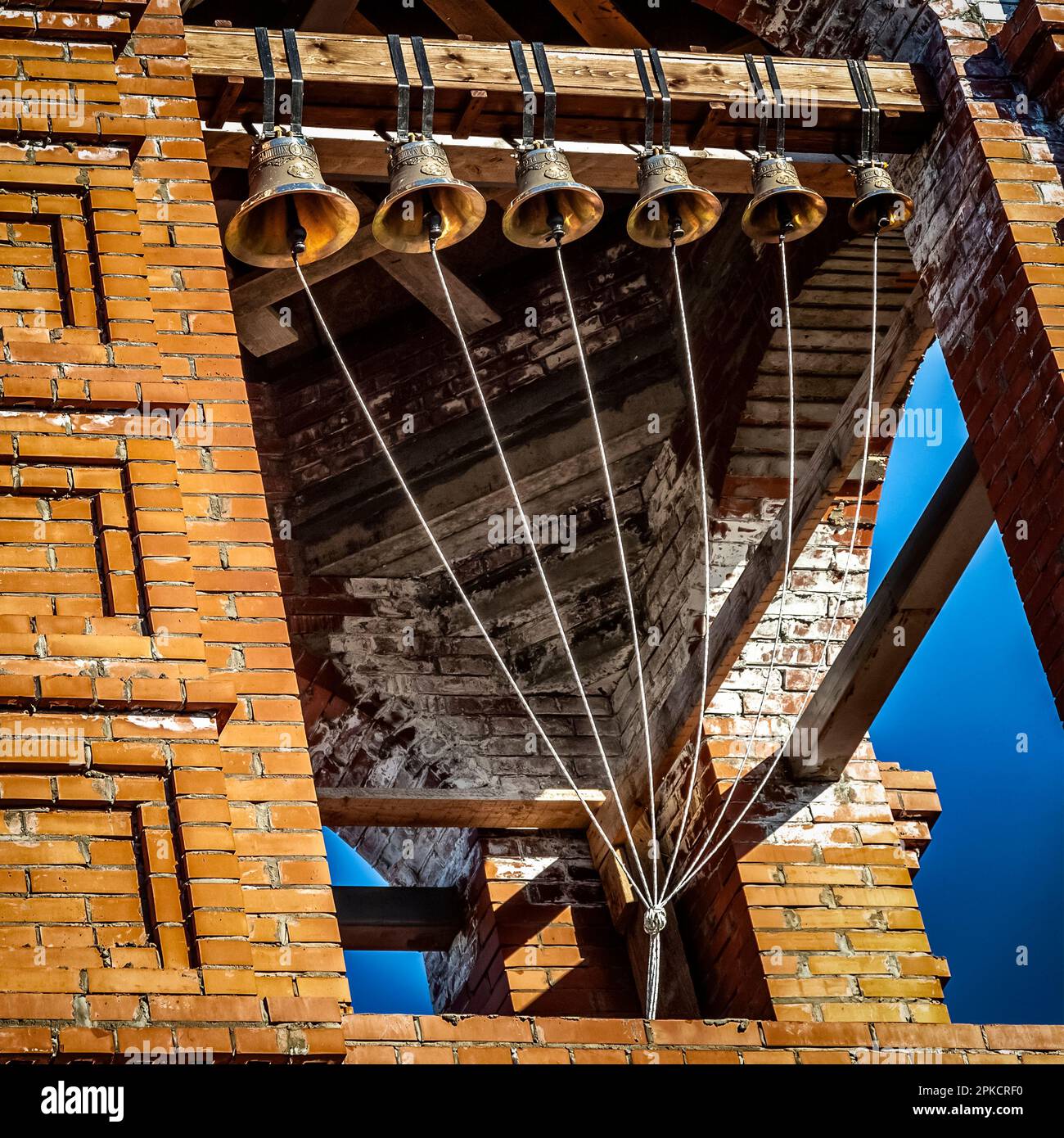 Brand new bells on a newly built bell tower Stock Photo - Alamy