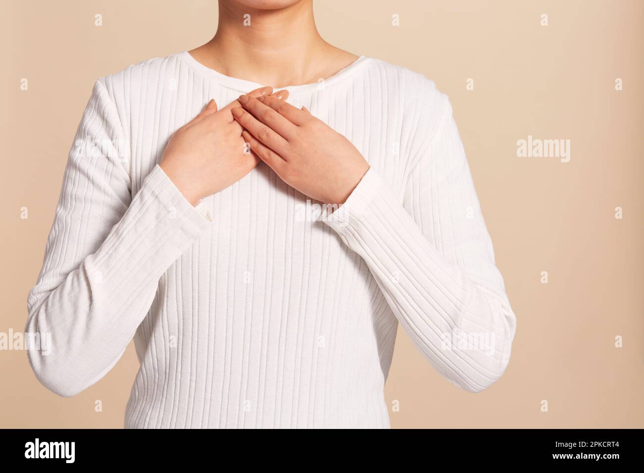 Hand at chest hi-res stock photography and images - Alamy
