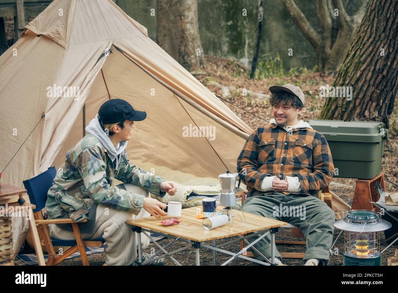 Two men camping in winter campground Stock Photo - Alamy