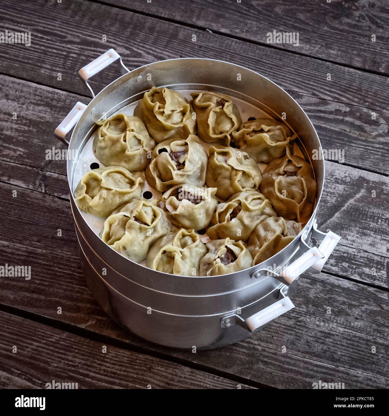 Ready-made hot manti in an aluminum cooker Stock Photo - Alamy
