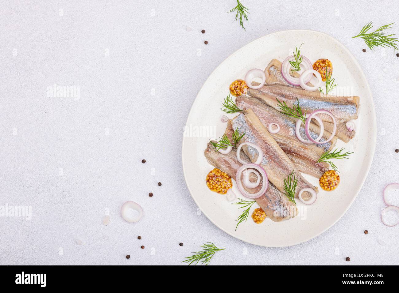 Salted herring with dijon mustard, dill and red onion rings. Marinated ...