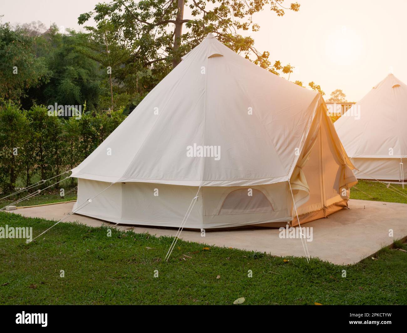 Camping picnic tent campground in outdoor hiking forest. Camper while ...