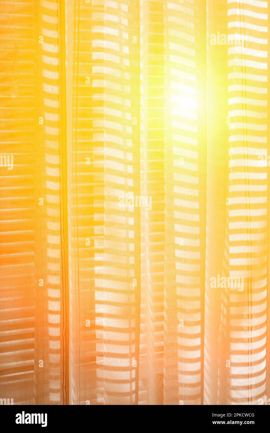 Bright sunlight through the curtain on the window Stock Photo - Alamy