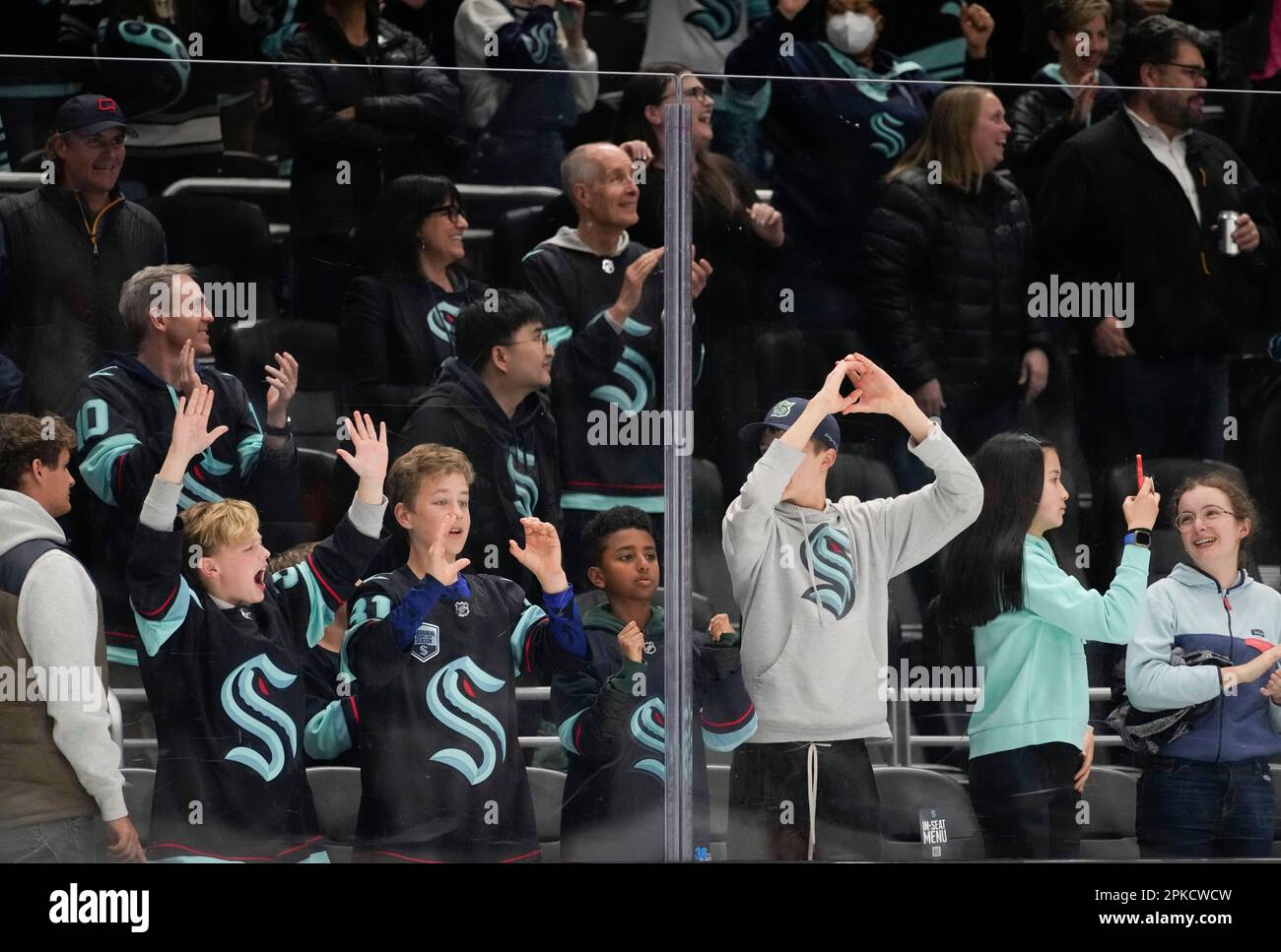 Seattle Kraken fans celebrate a 4-2 win over the Arizona Coyotes in an ...