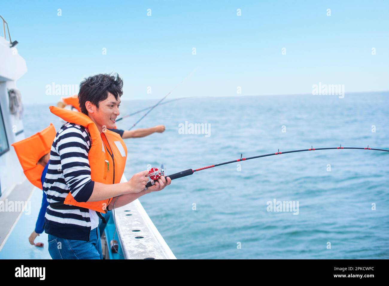 Person fishing boat hi-res stock photography and images - Alamy