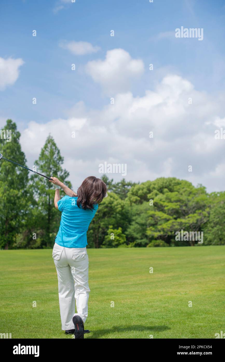 Middle-aged and older women playing golf Stock Photo - Alamy