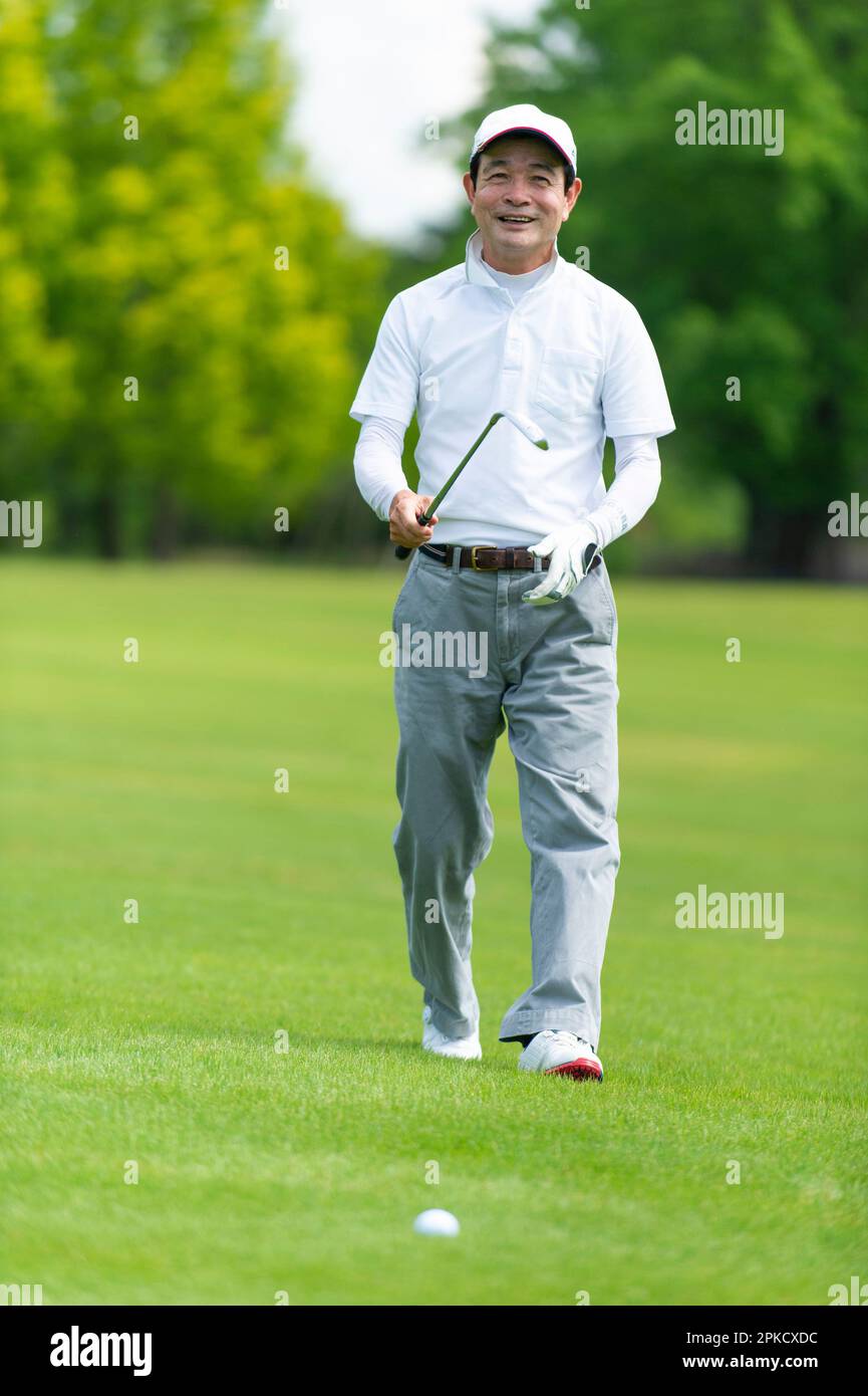 Middle aged men playing sport hi-res stock photography and images - Alamy