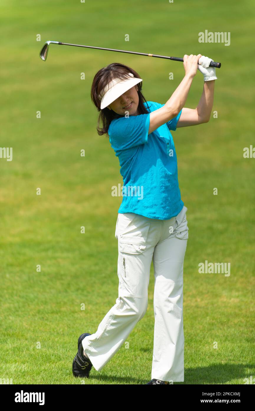 Middle-aged and older women playing golf Stock Photo - Alamy