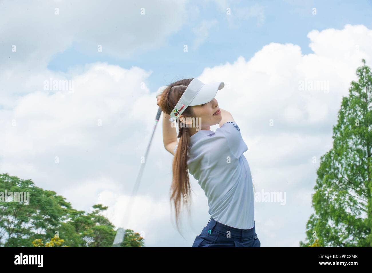 Asian women playing golf hi-res stock photography and images - Alamy