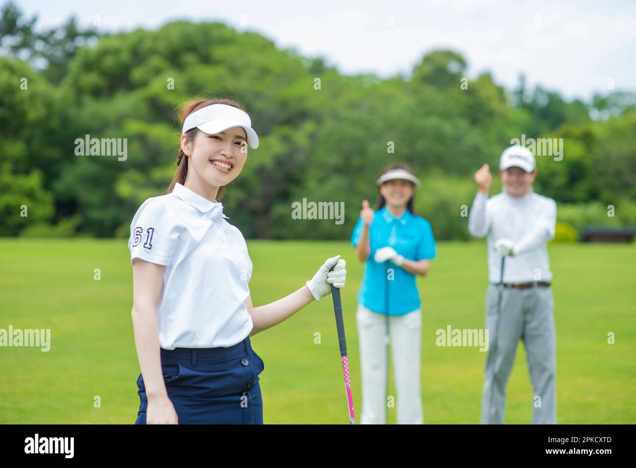 Mother and Daughter Playing Golf Stock Photo - Alamy
