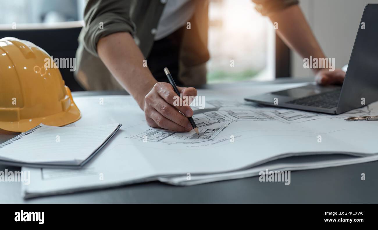 engineer man working in office with blueprints.Engineer inspect ...