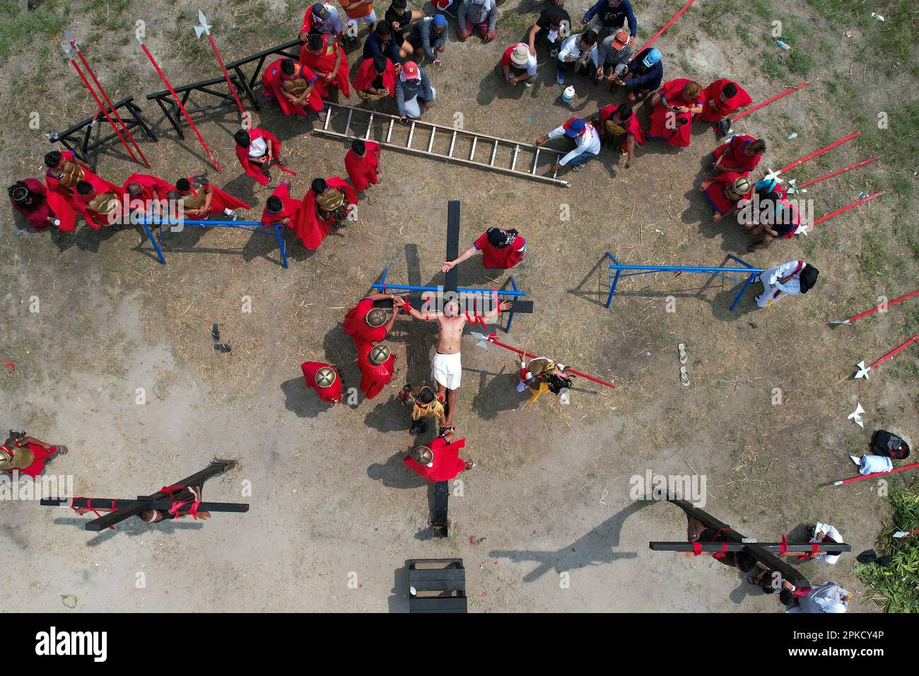 Ruben Enaje is nailed to the cross during a reenactment of Jesus Christ ...