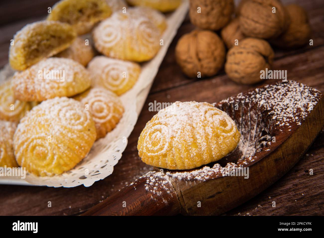 Traditional eid maamoul or mamoul cookies with dates, nuts, and jam ...
