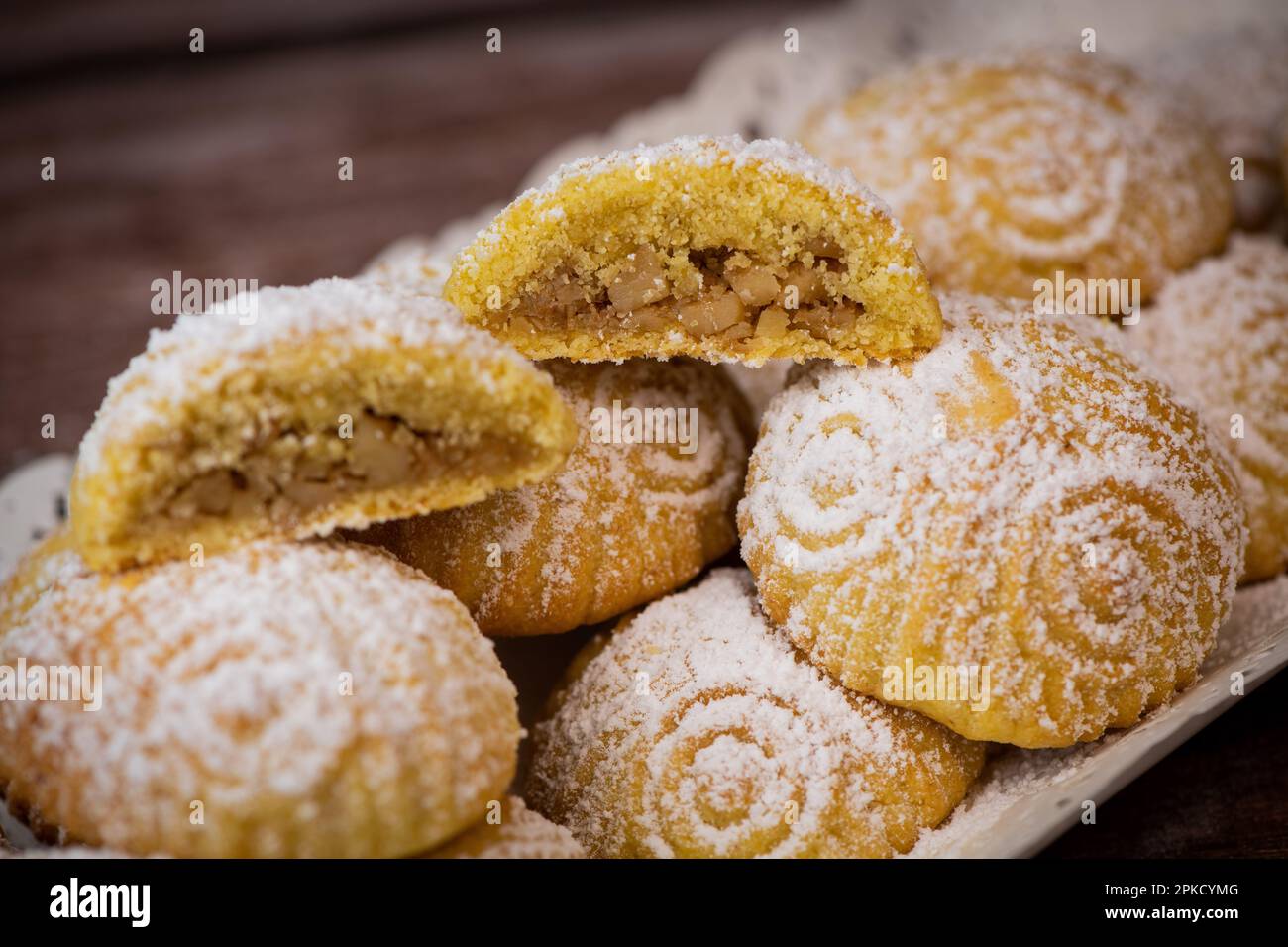 Traditional eid maamoul or mamoul cookies with dates, nuts, and jam ...