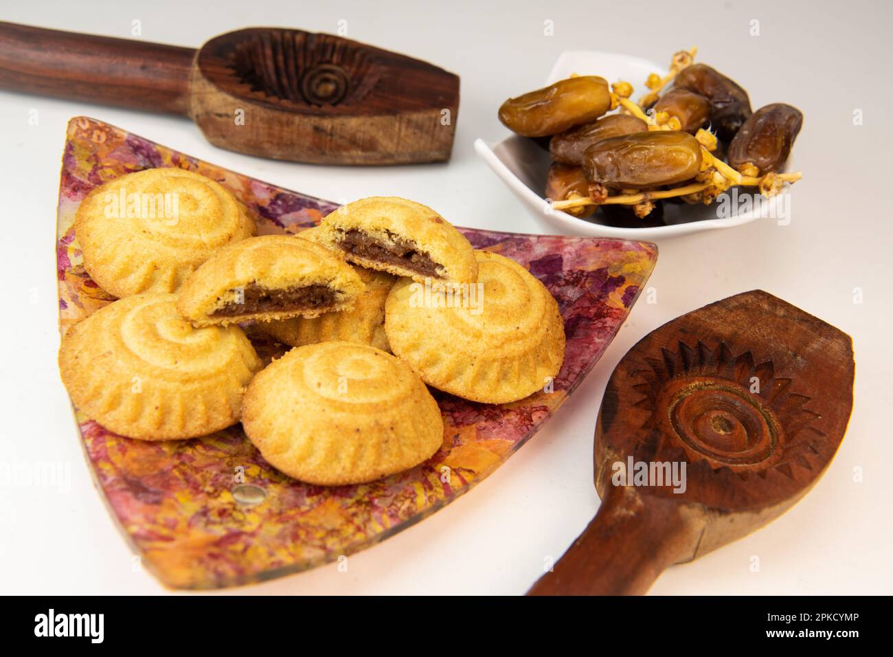 Traditional eid maamoul or mamoul cookies with dates, nuts, and jam ...