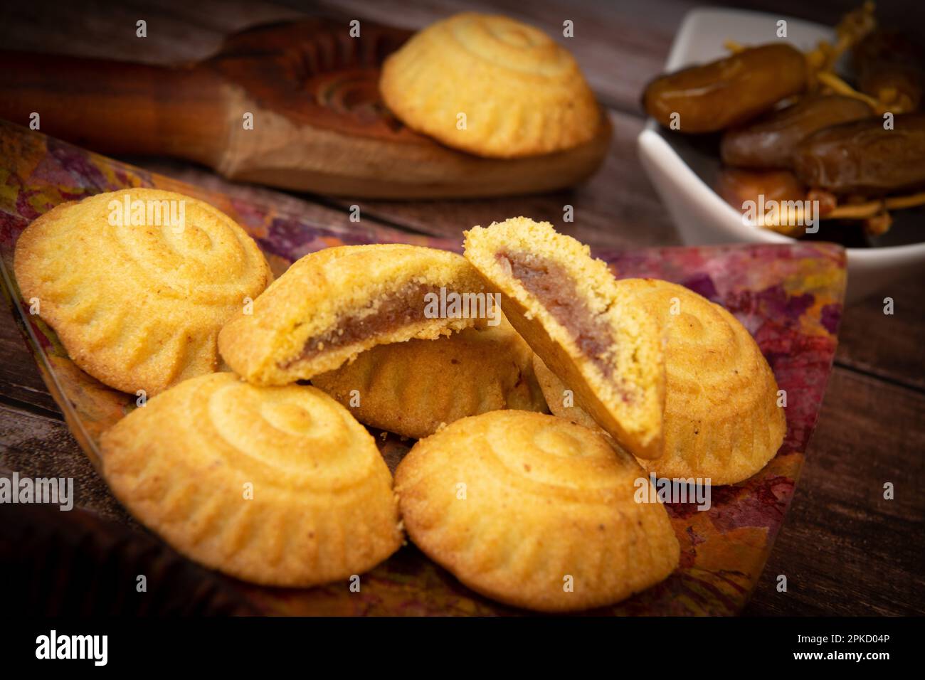 Traditional eid maamoul or mamoul cookies with dates, nuts, and jam ...