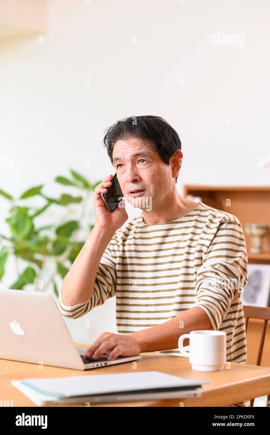 Middle-aged and older men who telework Stock Photo - Alamy