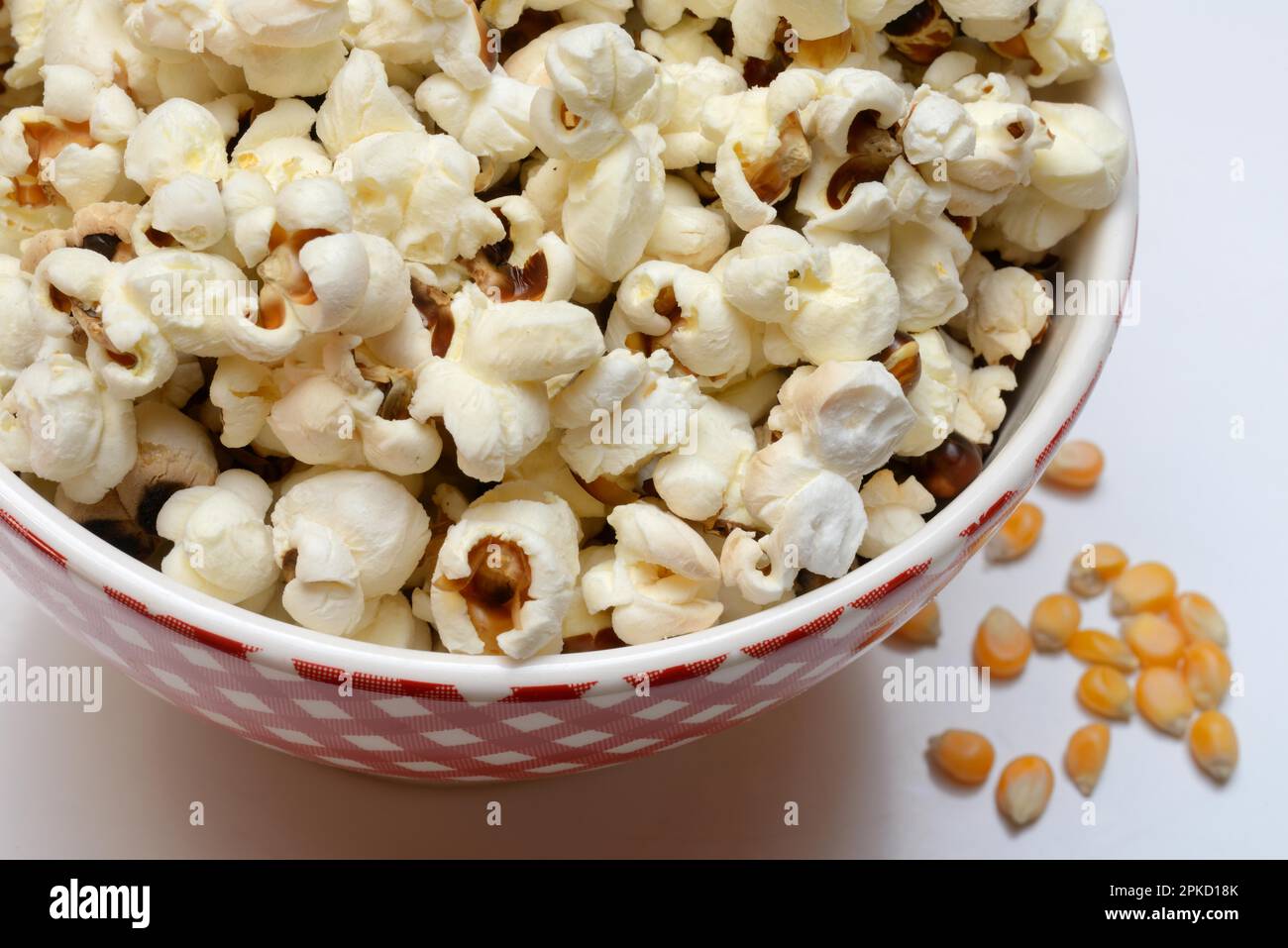Popcorn (Zea mays) in shell and corn kernels, puffed corn, puffed corn ...