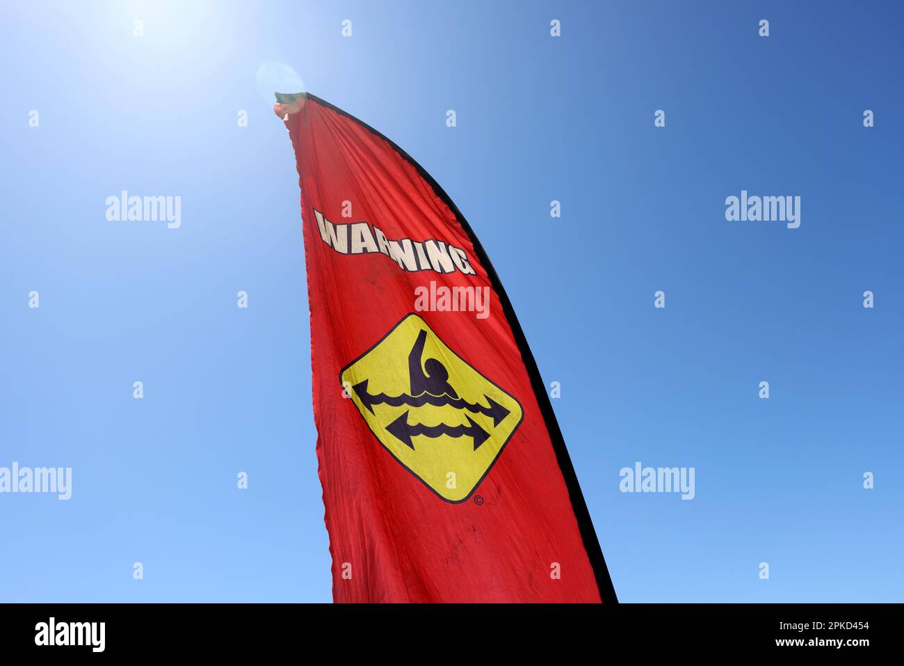 Red Swimming Warning flag of strong currents on Ventura Beach ...