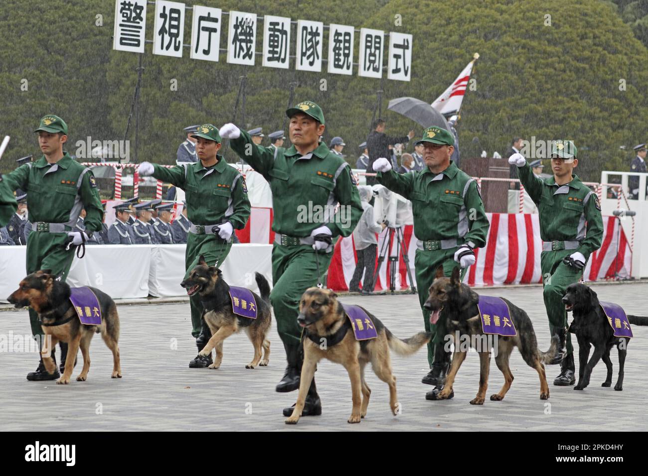 The Tokyo Metropolitan Police Department's riot squad march with ...