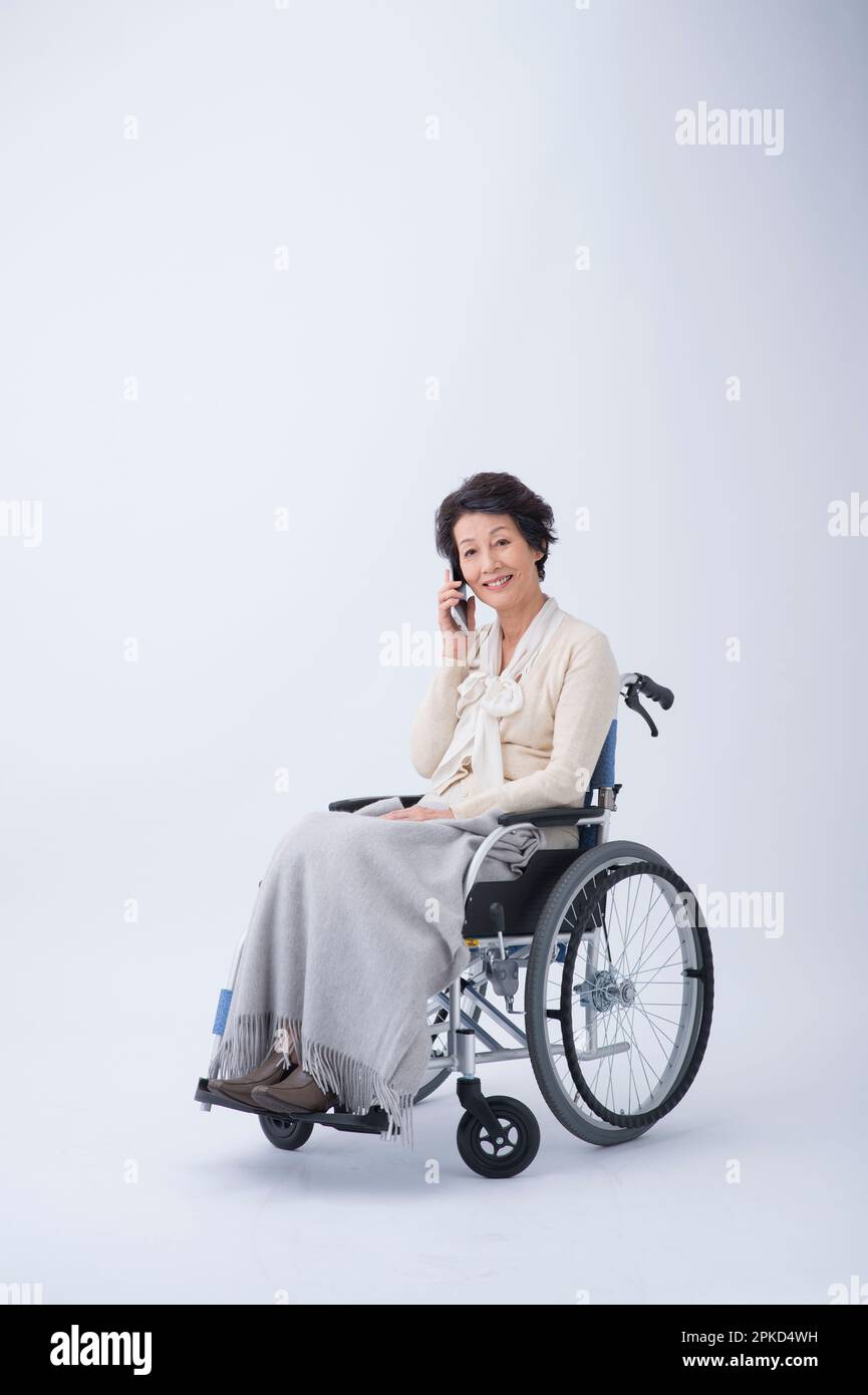 senior woman in wheelchair Stock Photo - Alamy