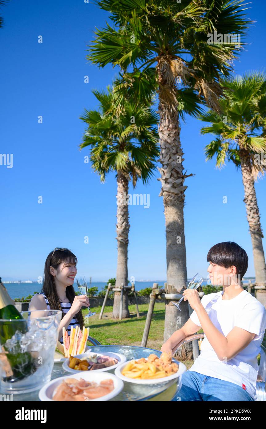 couples dining in a sea resort Stock Photo - Alamy