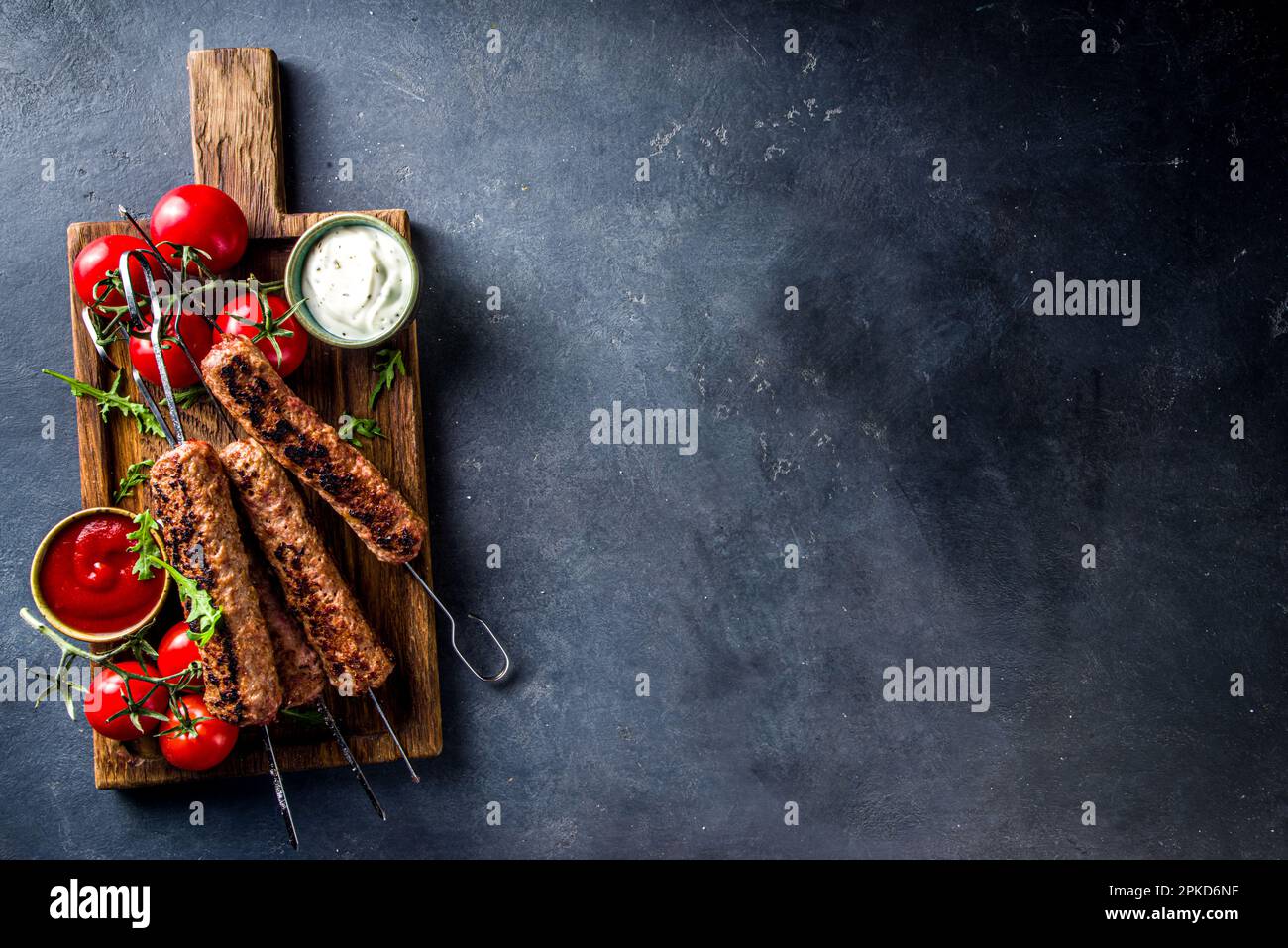 Shish kebab on skewers, from minced beef meat. Lula kebab, traditional ...