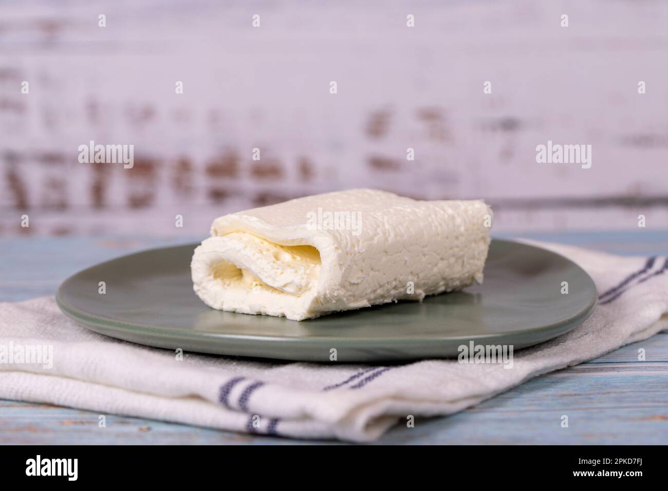 Fresh cow's cream. Dairy products. Cow's cream or clotted cream on wood ...