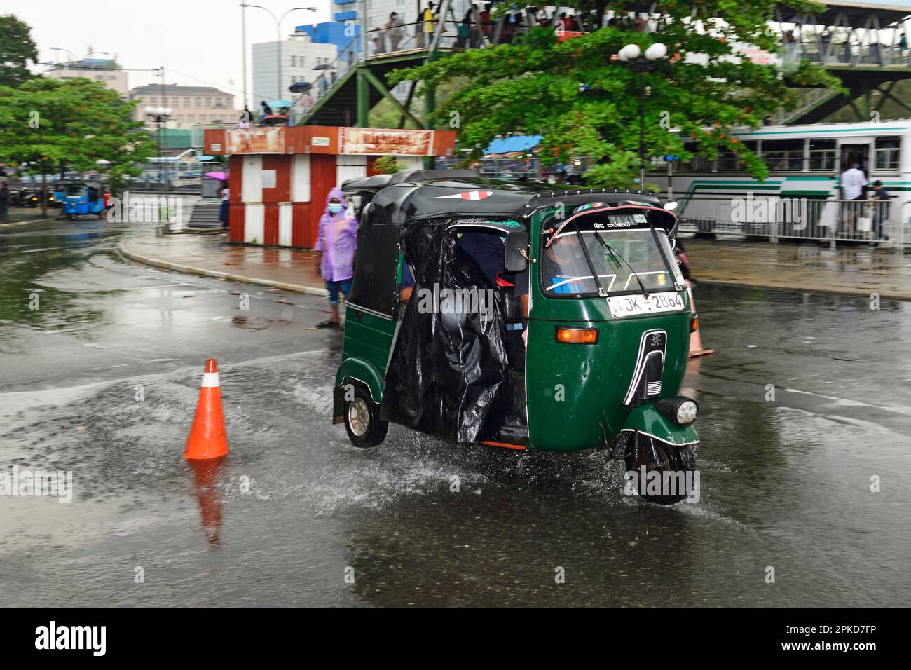 Tuktuk in the pouring rain, Colombo, Sri Lanka Stock Photo - Alamy
