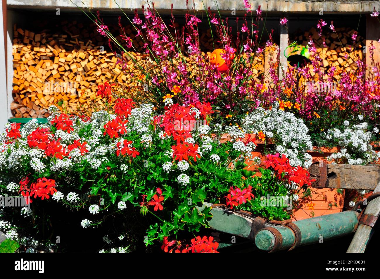 Summer, hay carts, flower arrangements Stock Photo - Alamy