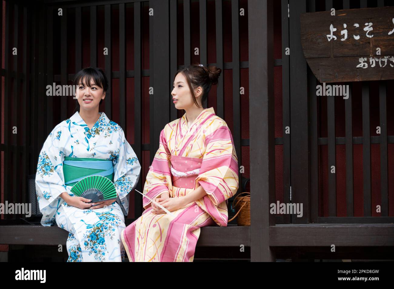 Old house and two women in yukata Stock Photo - Alamy