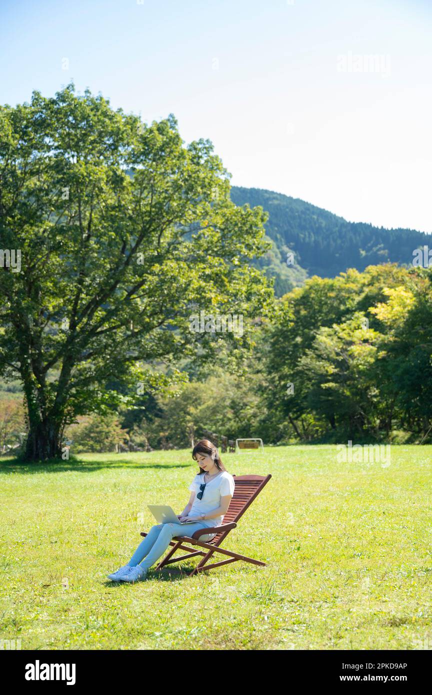 Working remotely with cell phone hi-res stock photography and images ...
