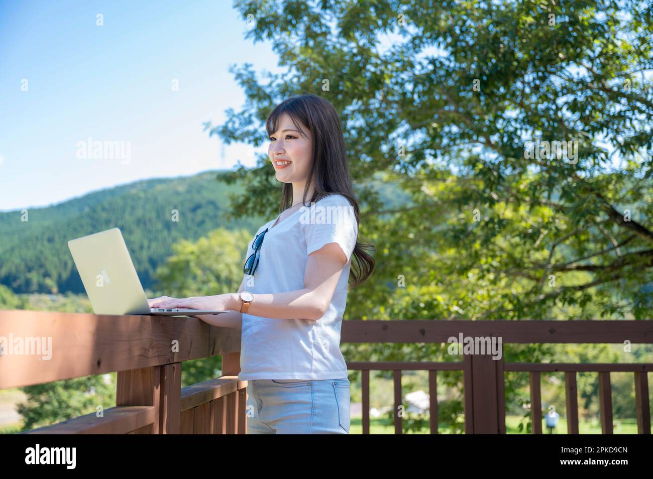 Asian woman working remotely from hi-res stock photography and images ...