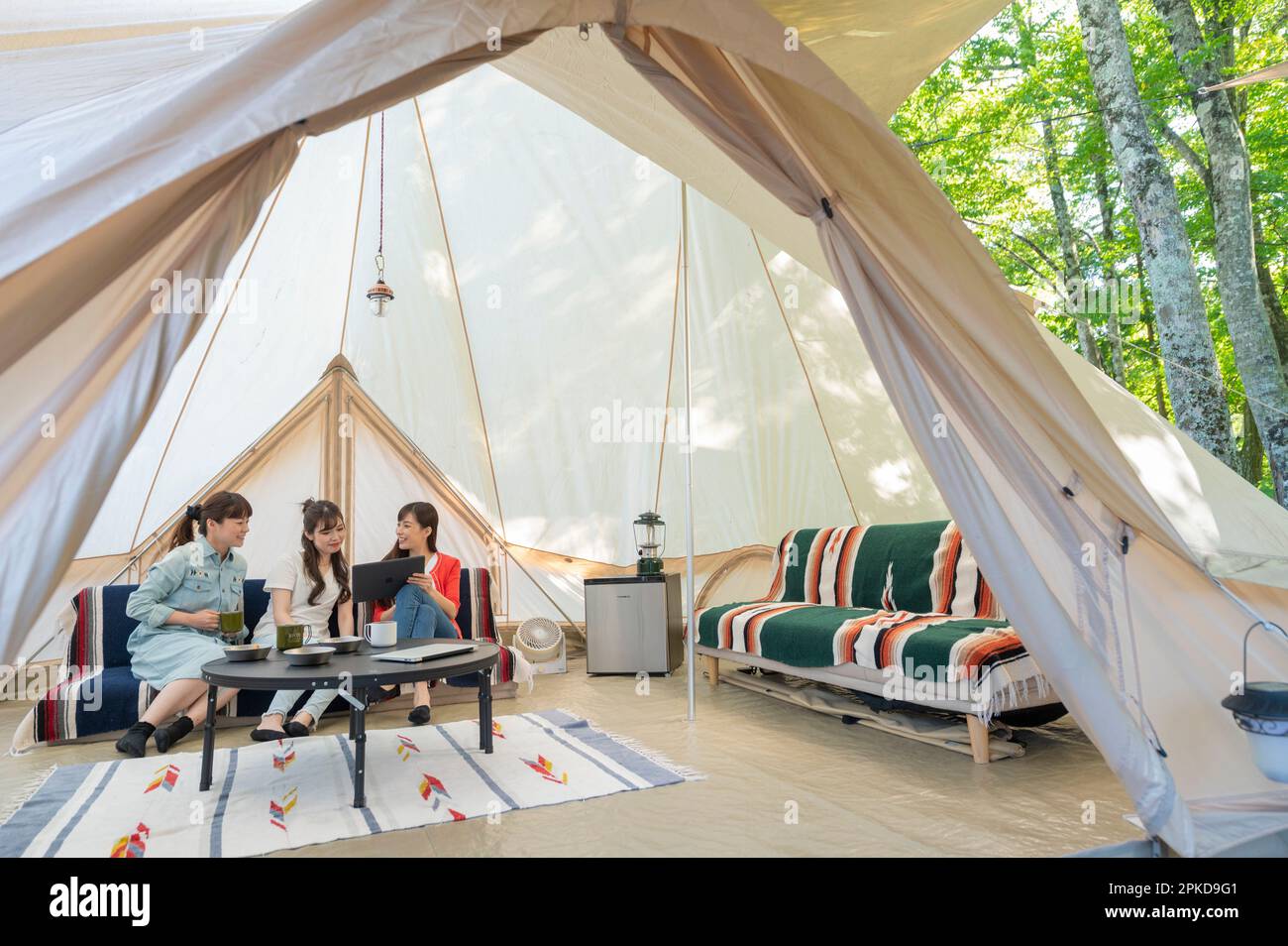 3 women glamping Stock Photo - Alamy