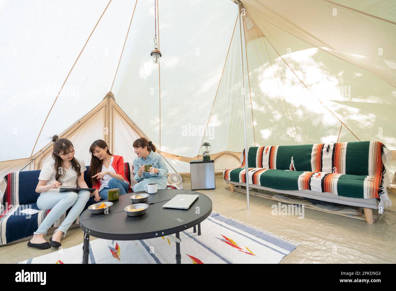 3 women glamping Stock Photo - Alamy