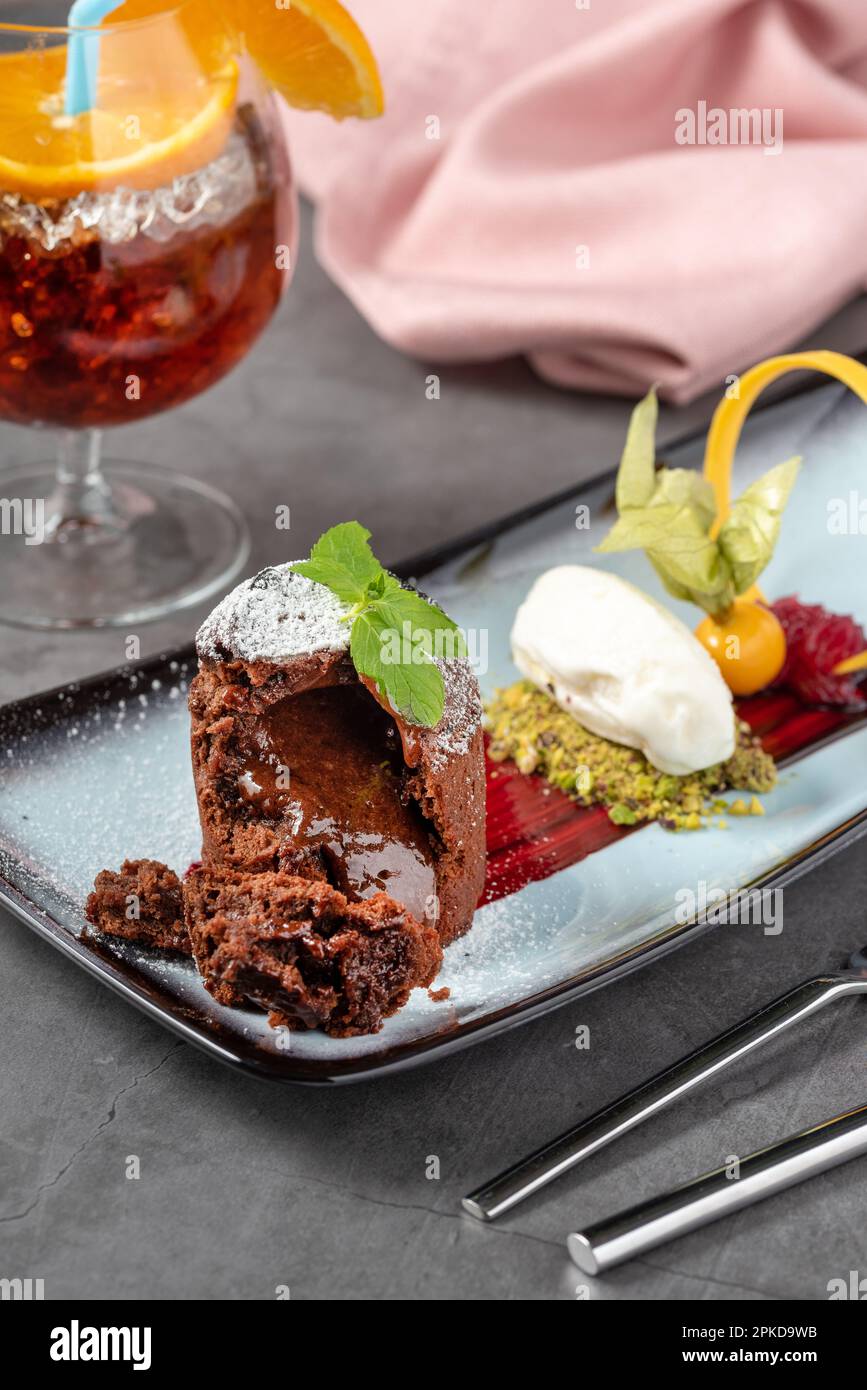 Chocolate souffle with ice cream served in a fine dining restaurant ...