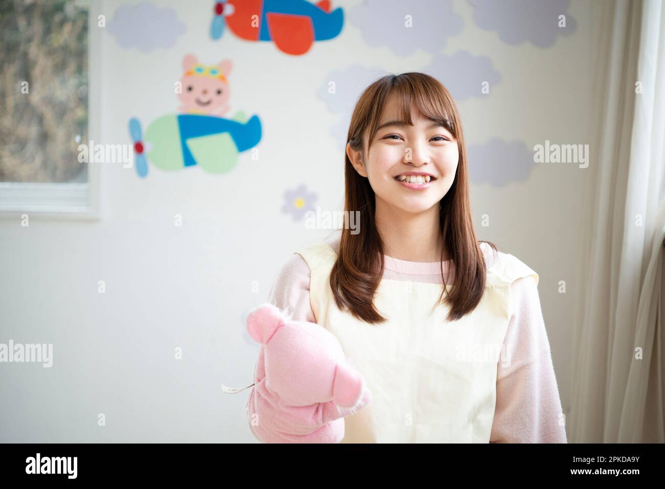 Daycare worker hi-res stock photography and images - Alamy