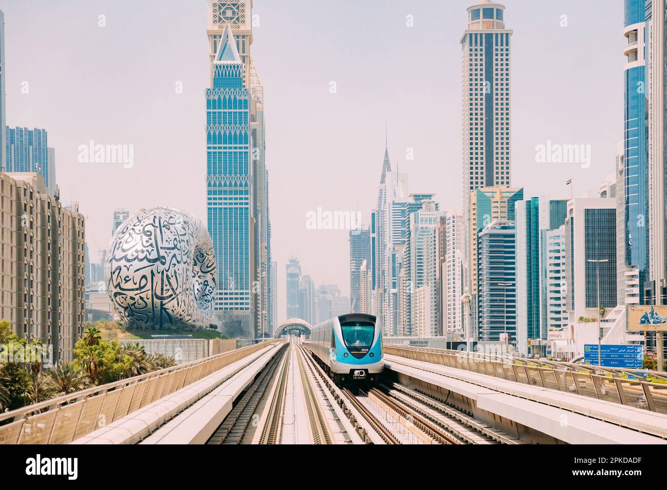 Monorail Subway train rides among glass skyscrapers in Dubai. Traffic ...