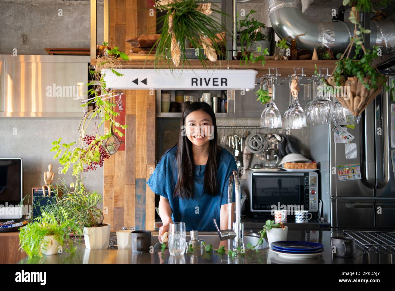 Woman kitchen looking at camera one person hi-res stock photography and ...