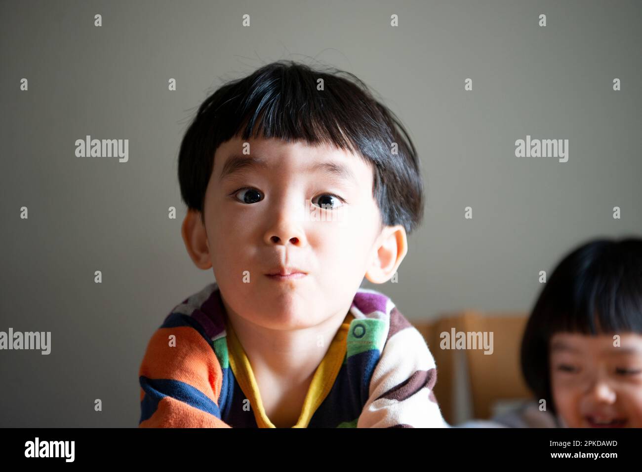 Boy eating a snack Stock Photo - Alamy