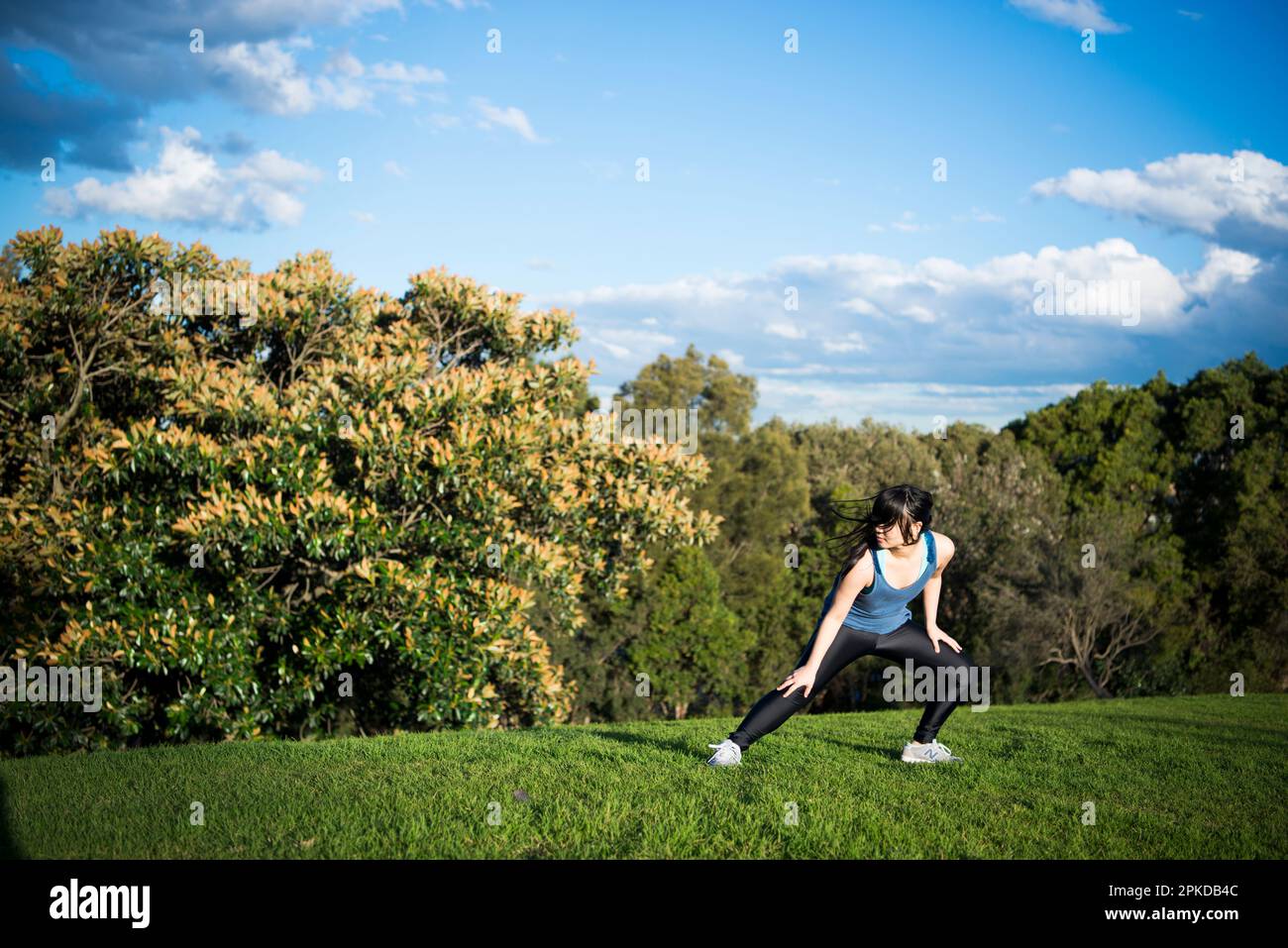 Main doing stretching exercises hi-res stock photography and images - Alamy