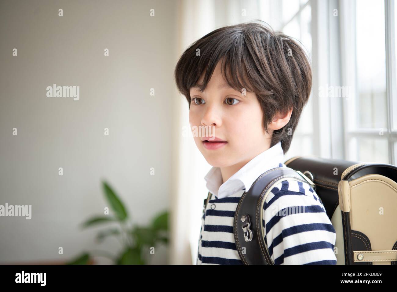 Carrying school bag hi-res stock photography and images - Alamy