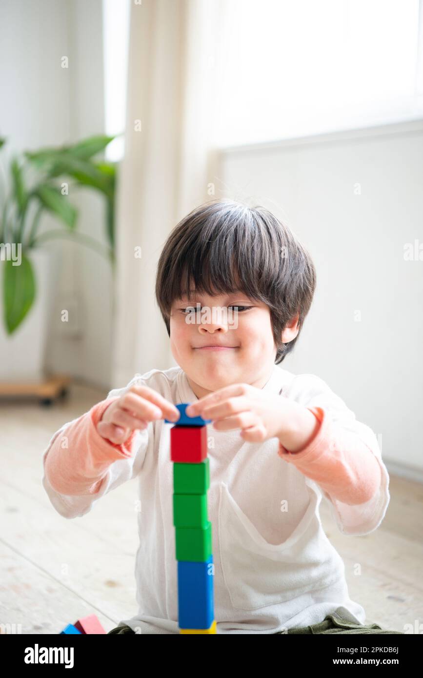 Children playing with blocks Stock Photo - Alamy