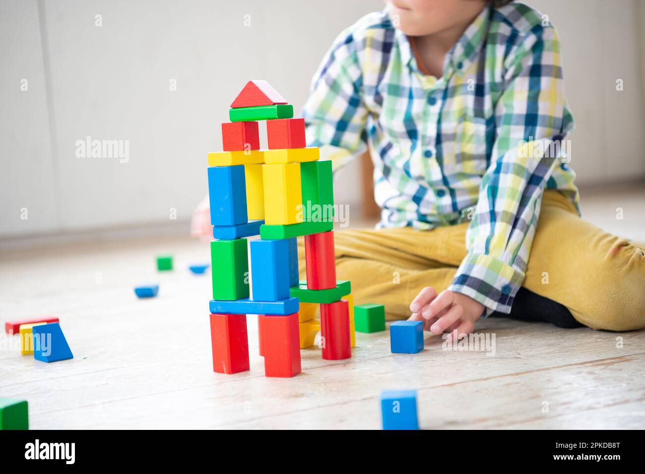 Children playing with building blocks Stock Photo - Alamy