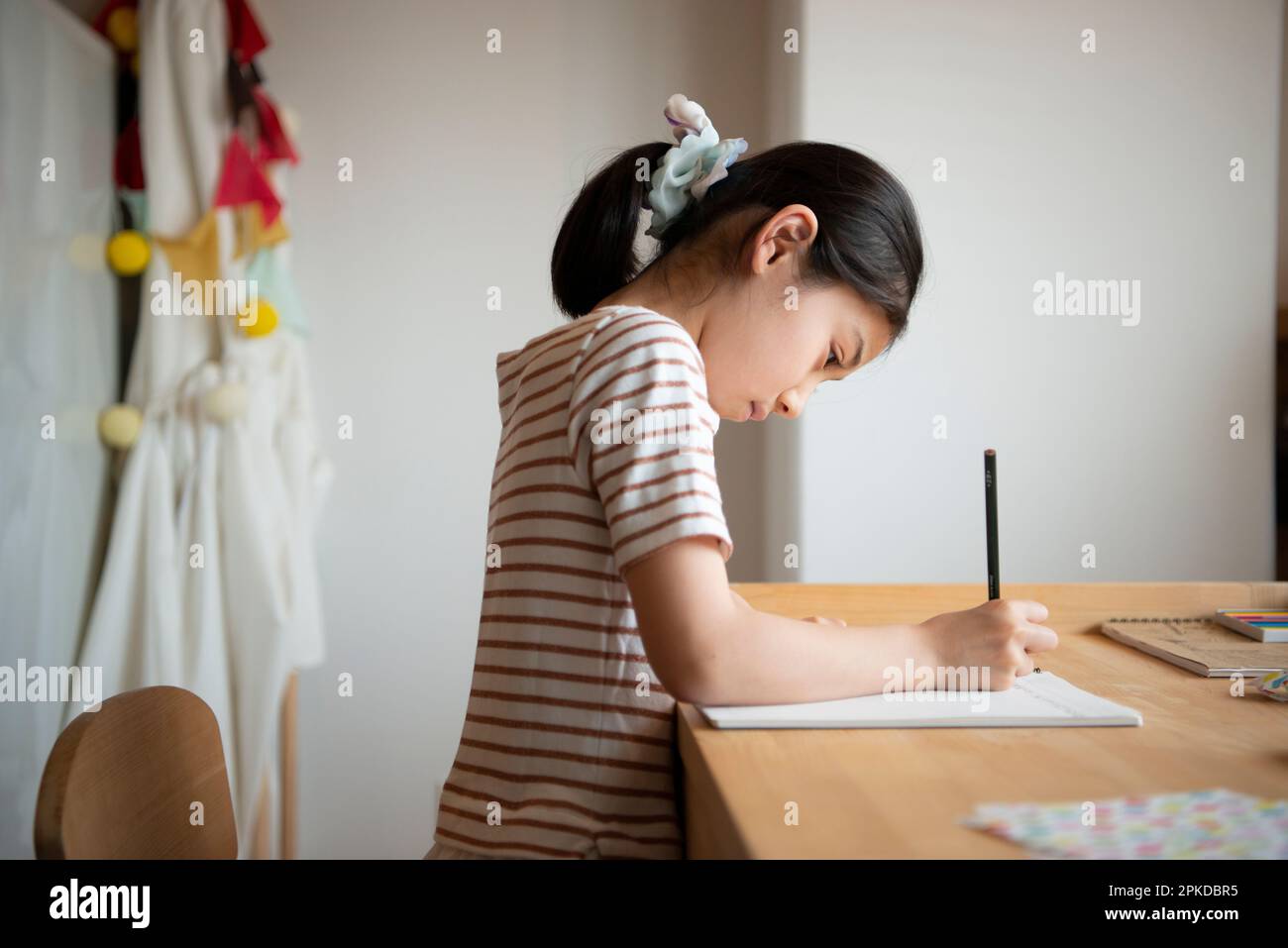 Asian girl home study hi-res stock photography and images - Alamy