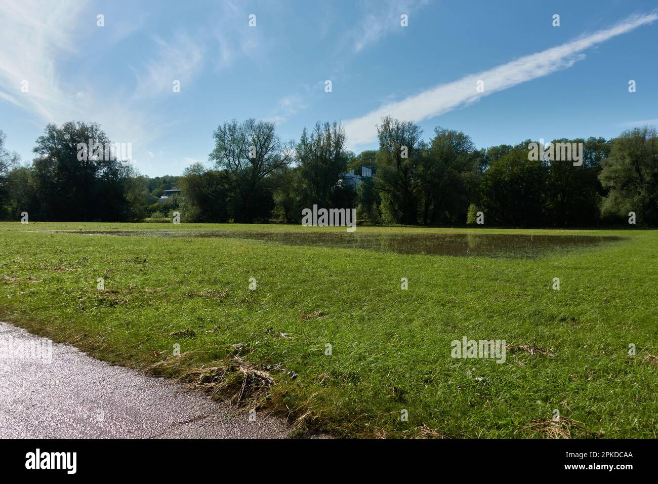 Water on a green field. Consequences of severe storm and flooding ...