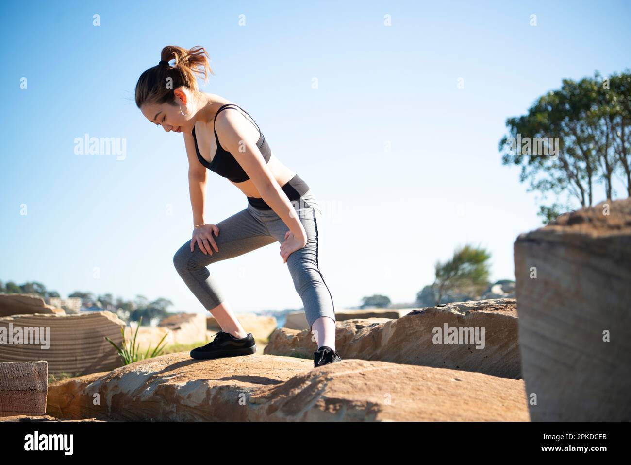 Woman Prepping for Exercise Stock Photo - Alamy